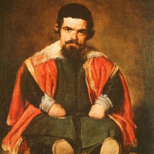A Dwarf Sitting On The Floor | Atomic Academia